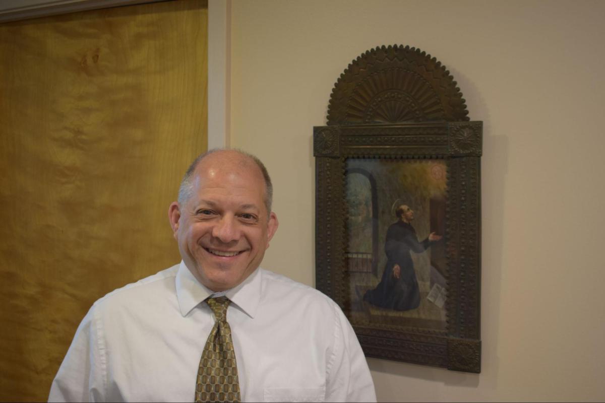 Romano earns doctoral degree | MAGIS